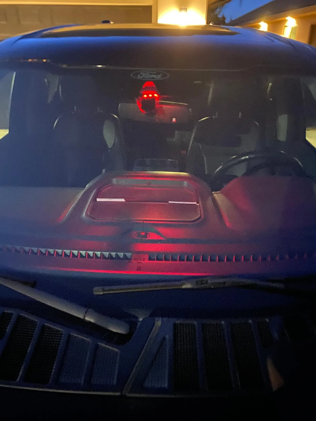Red light on windshield near rear view mirror always on | F150gen14 ...