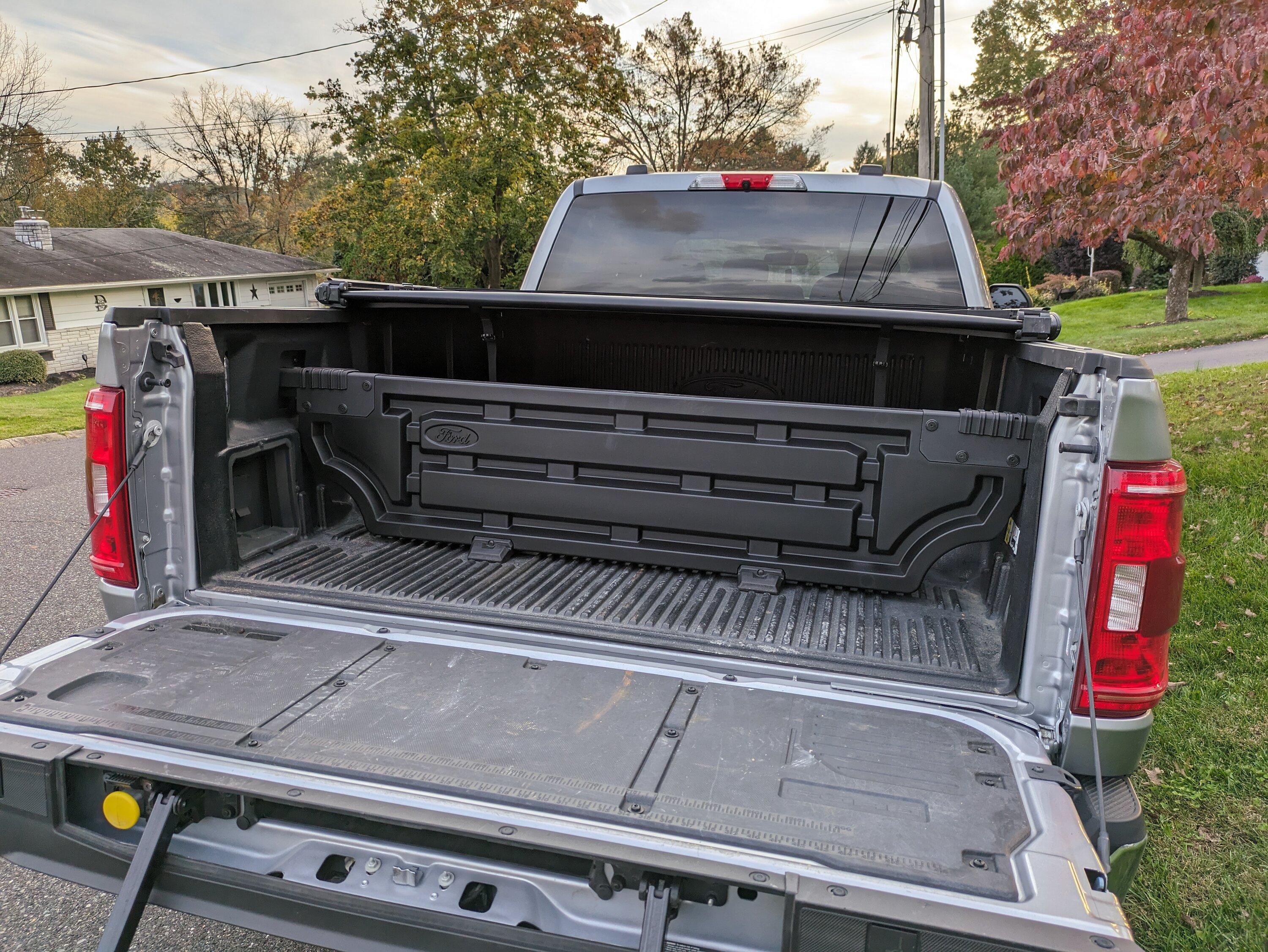 Finally got my bed setup: bed liner, tonneau cover, and bed divider ...